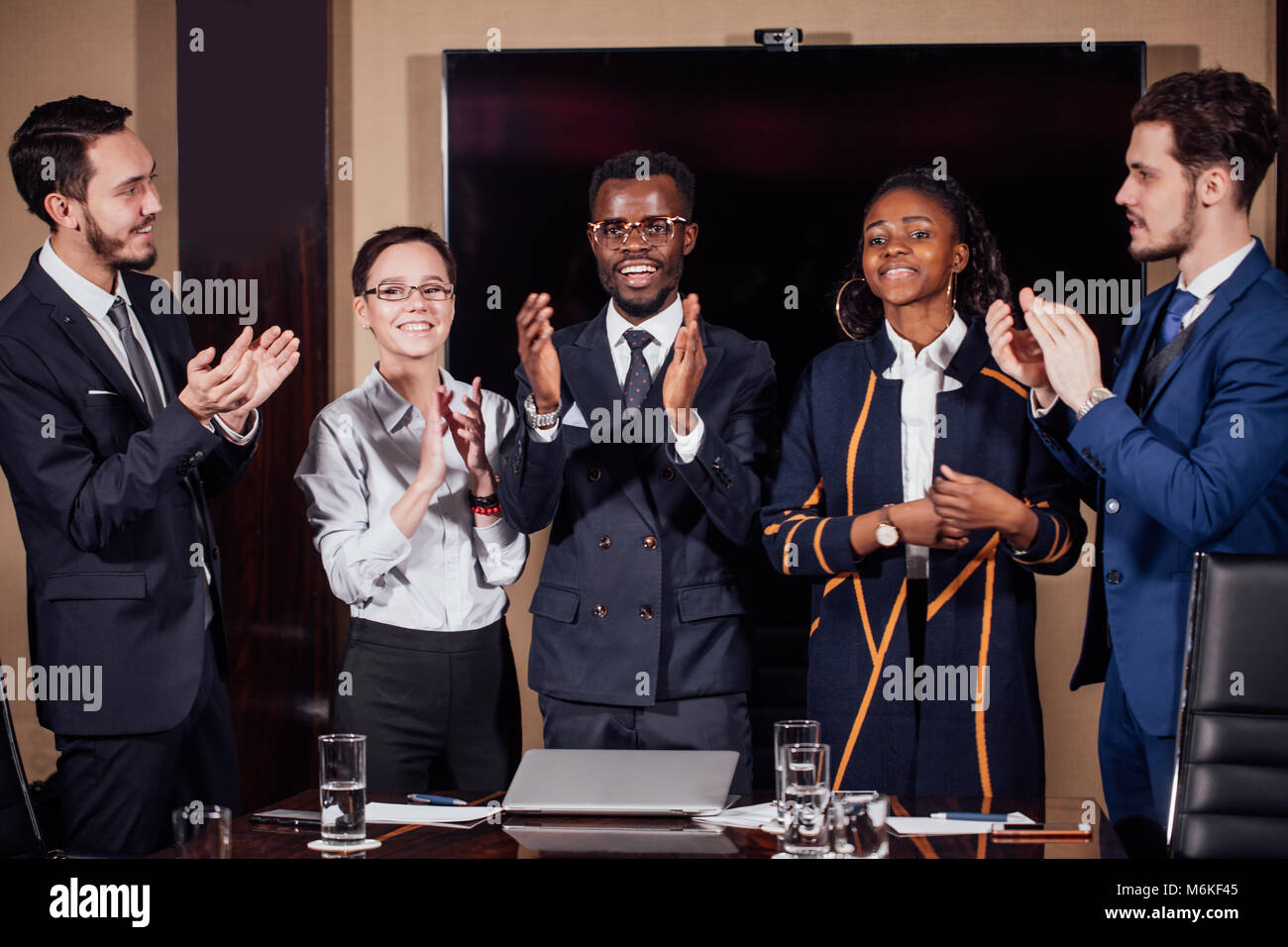 multiracial business team applauding in meeting room Stock Photo - Alamy multiracial business team applauding in meeting room Stock Photo - Alamy