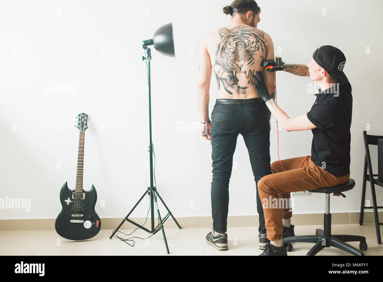 The master and the client Stock Photo - Alamy