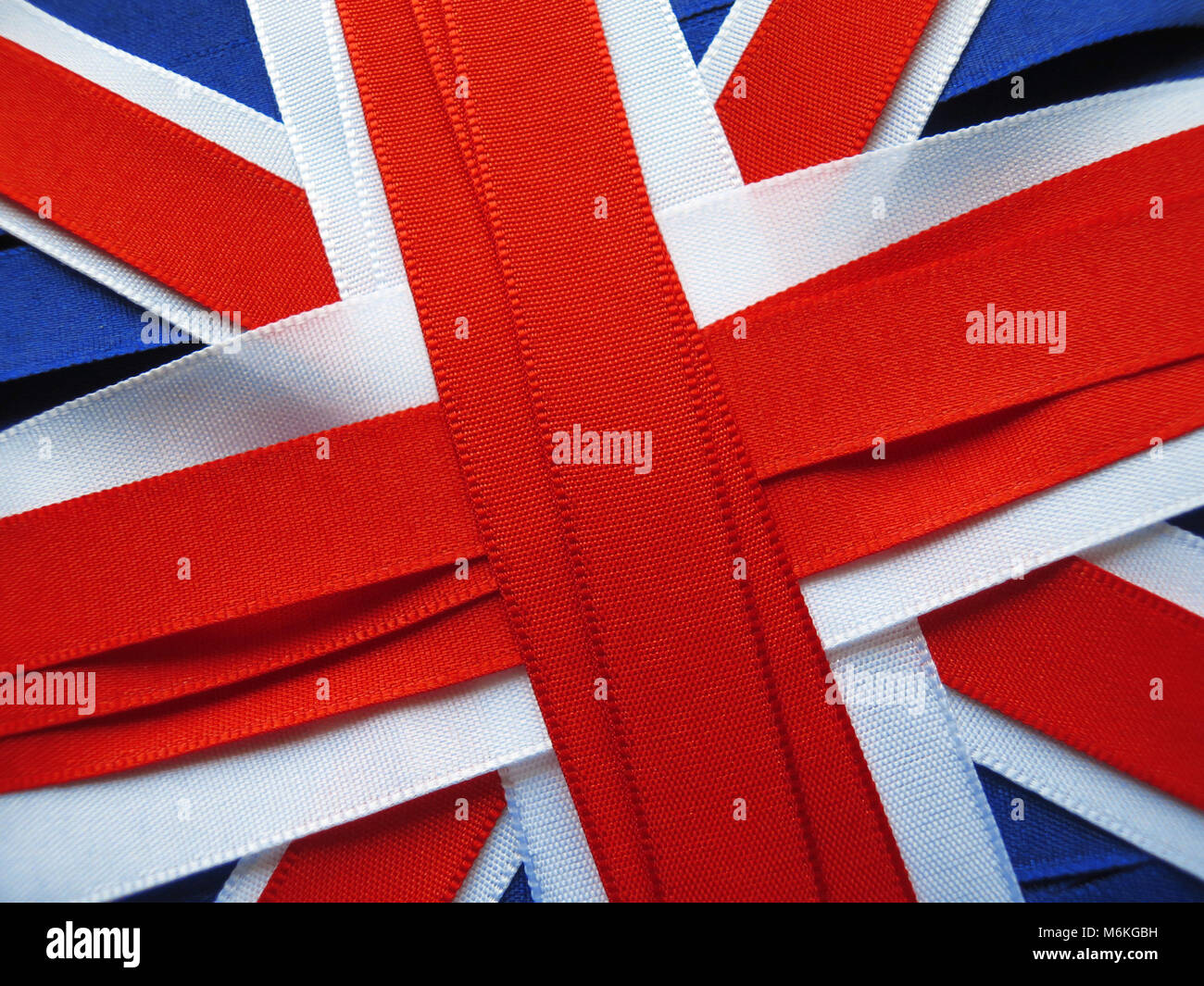 United Kingdom flag or banner made with blue, red and white ribbons ...