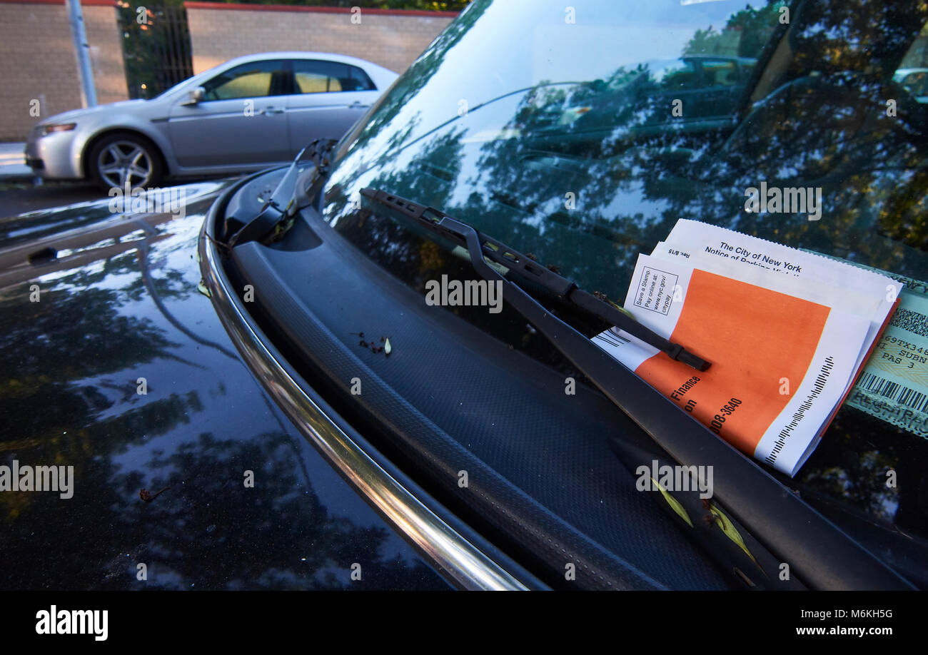 Parking ticket on car's window Stock Photo - Alamy