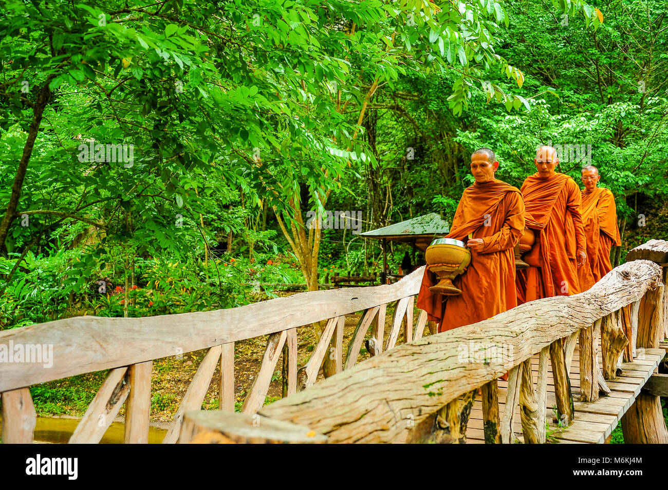 Buddhist monks on an alms march hi-res stock photography and images - Alamy