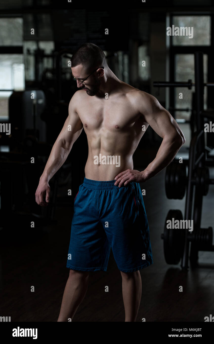 Geek flexing muscles hi-res stock photography and images - Alamy