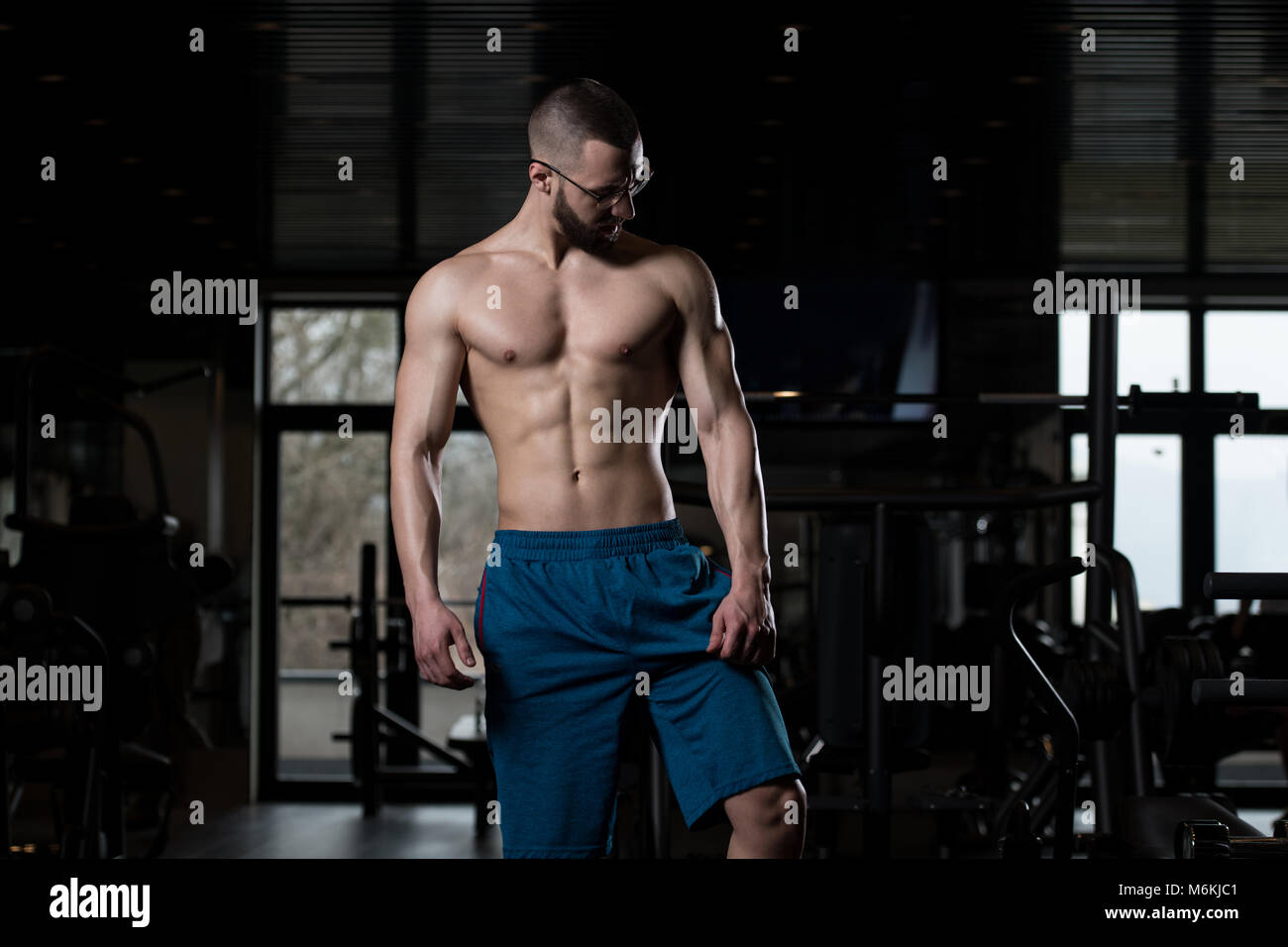 Geek flexing muscles hi-res stock photography and images - Alamy