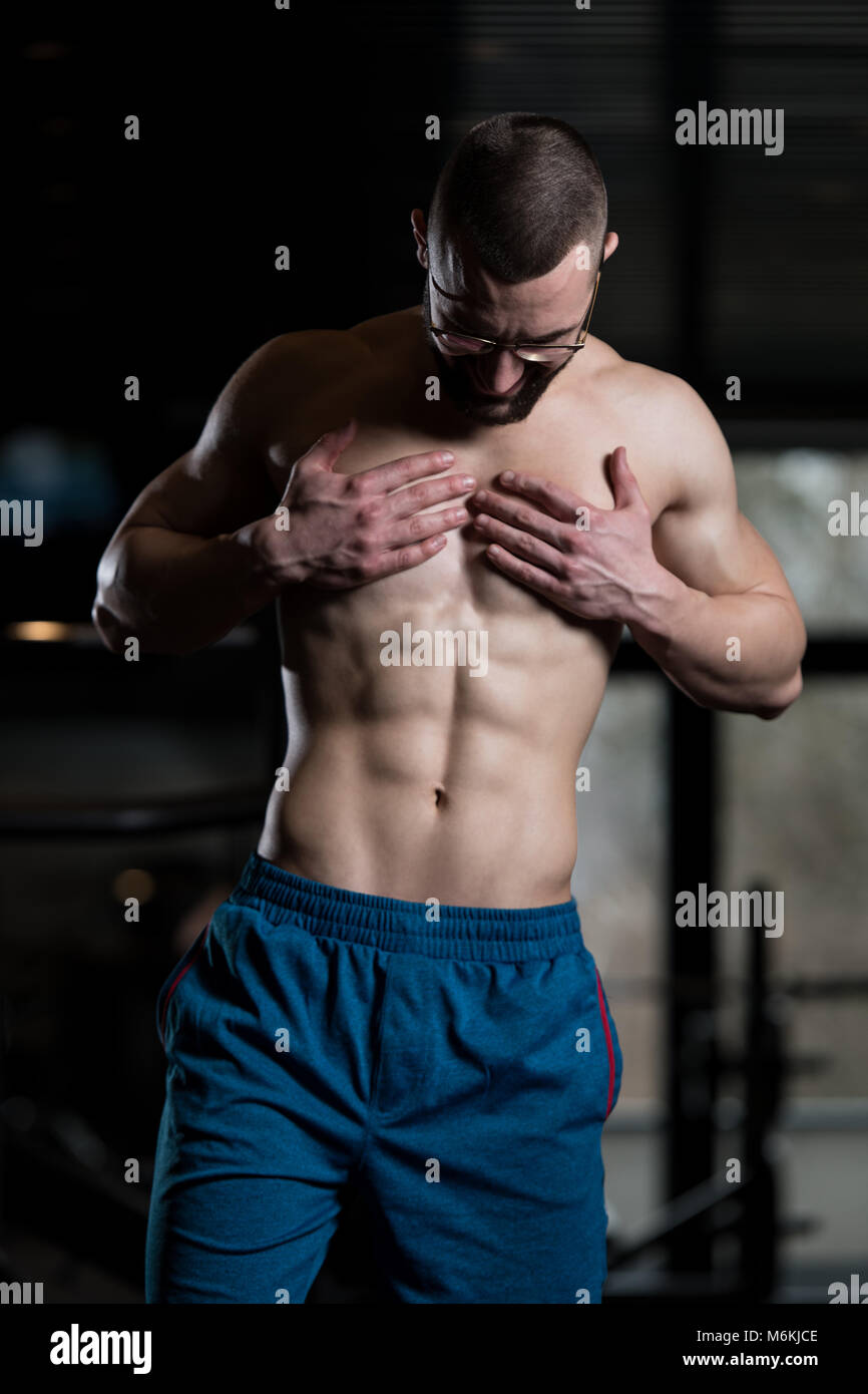 Geek flexing muscles hi-res stock photography and images - Alamy