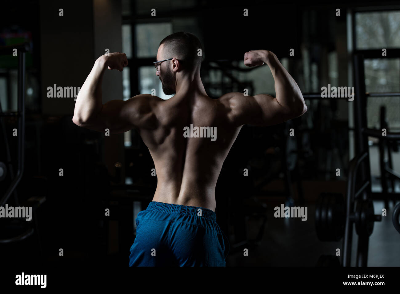 Geek flexing muscles hi-res stock photography and images - Alamy