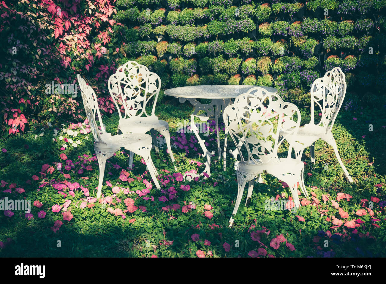 set of garden table on green grass Stock Photo - Alamy