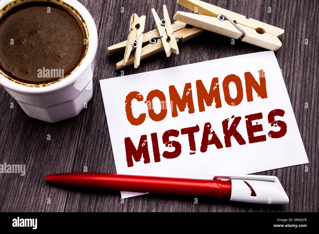Hand writing text caption inspiration showing Common Mistakes. Business ...