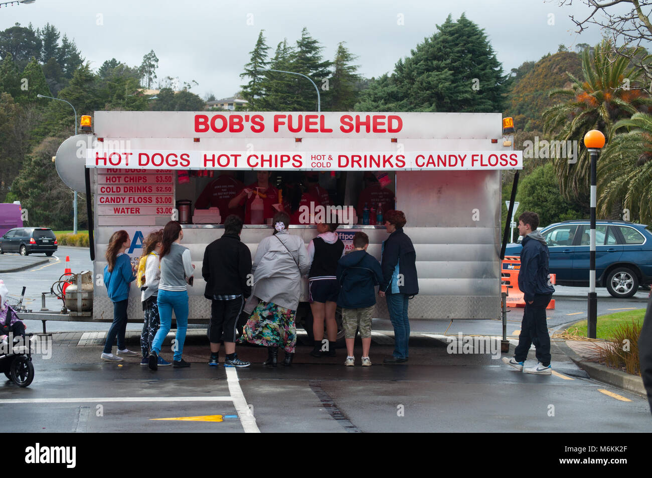 People Getting Hot Dogs And Hot Chips From A Food Van Stock Photo - Alamy