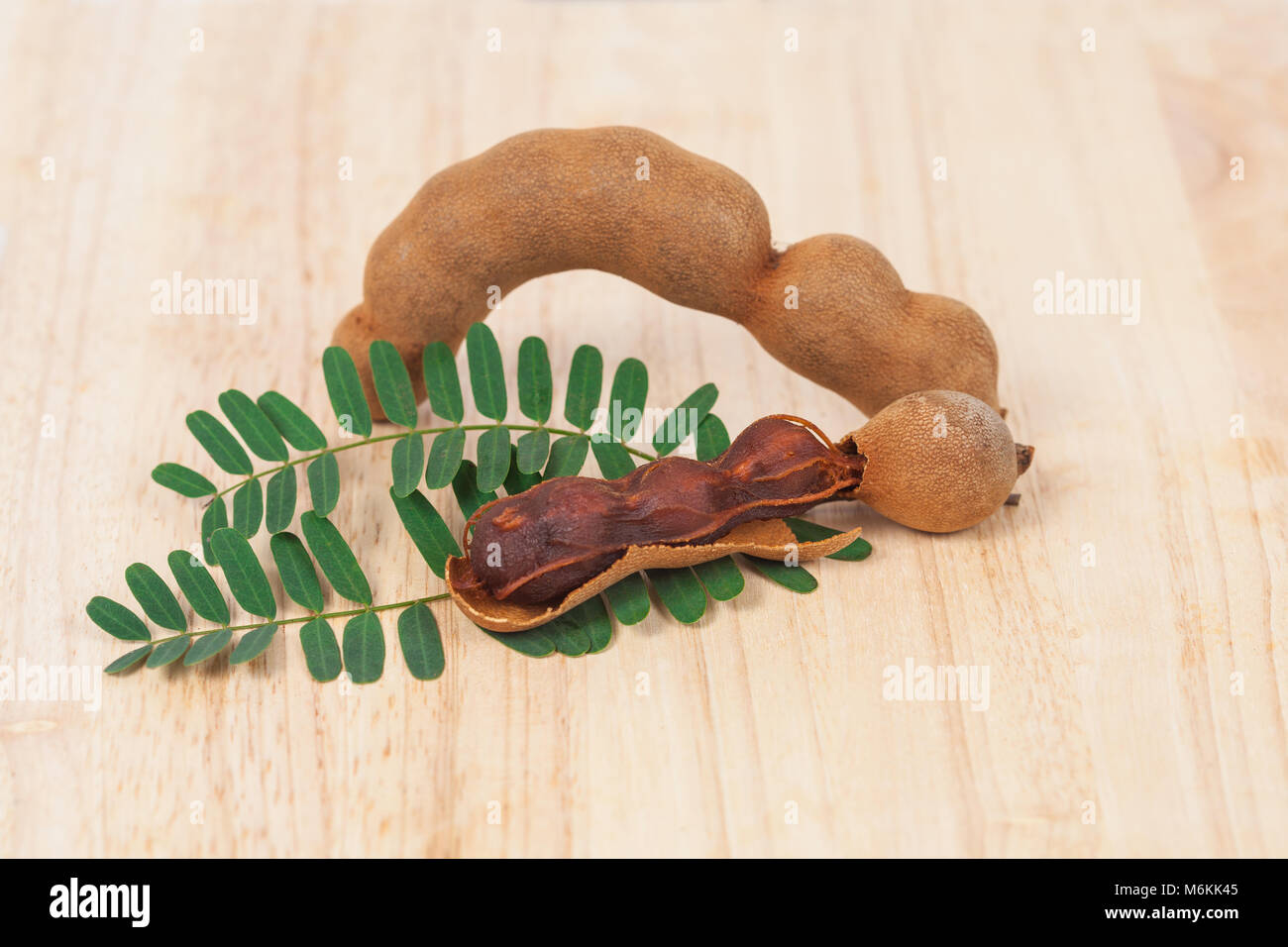 tamarind - Sweet ripe tamarind with isolated on a white background ...
