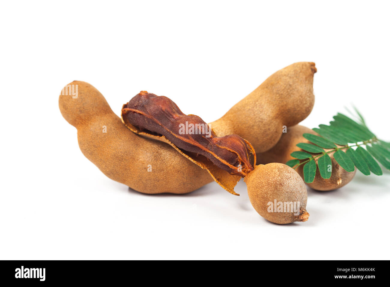tamarind - Sweet ripe tamarind with isolated on a white background ...