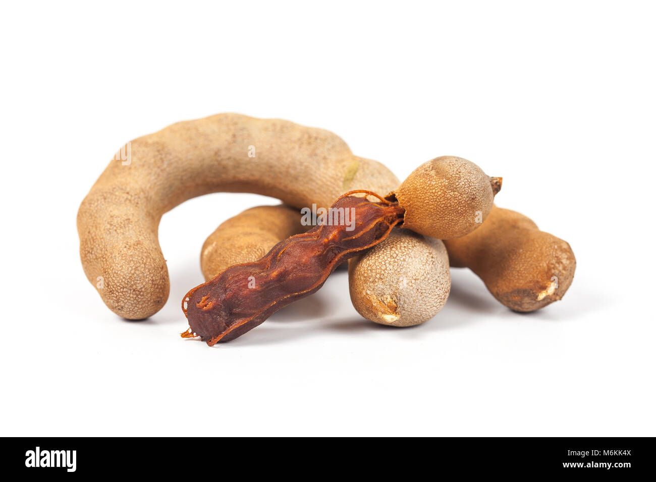 tamarind - Sweet ripe tamarind with isolated on a white background ...