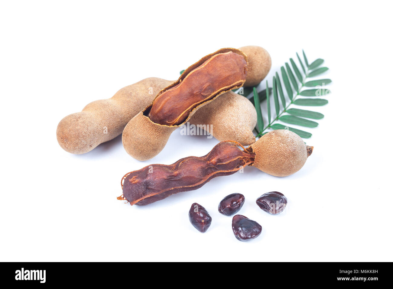 tamarind - Sweet ripe tamarind with isolated on a white background ...