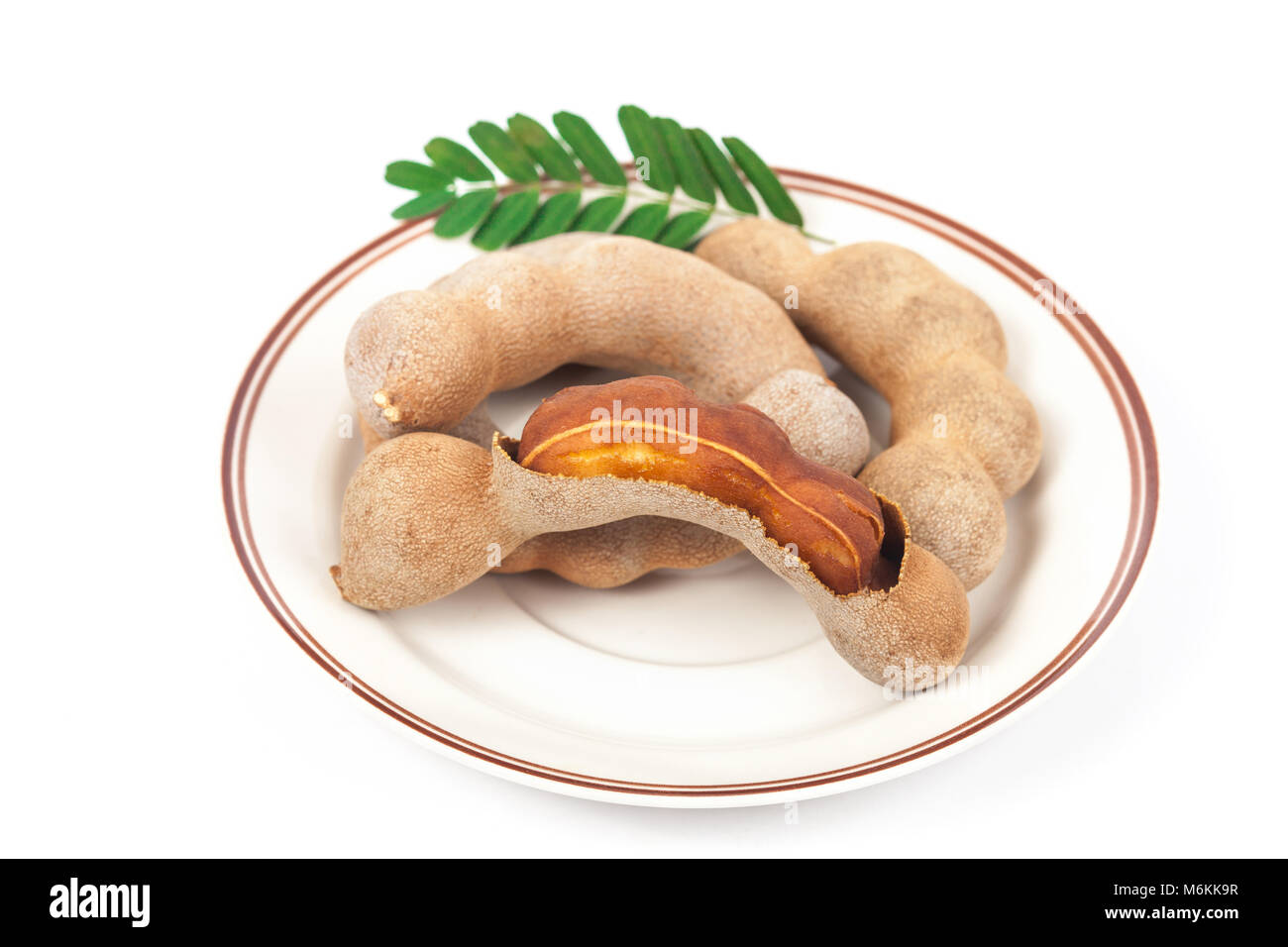 tamarind - Sweet ripe tamarind with isolated on a white background ...