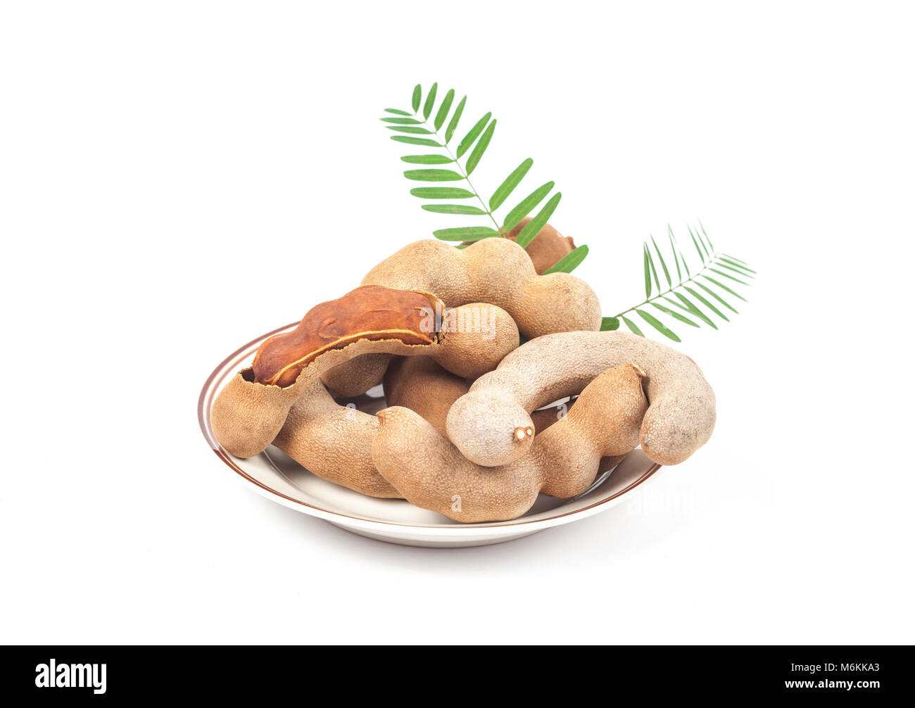 tamarind - Sweet ripe tamarind with isolated on a white background ...