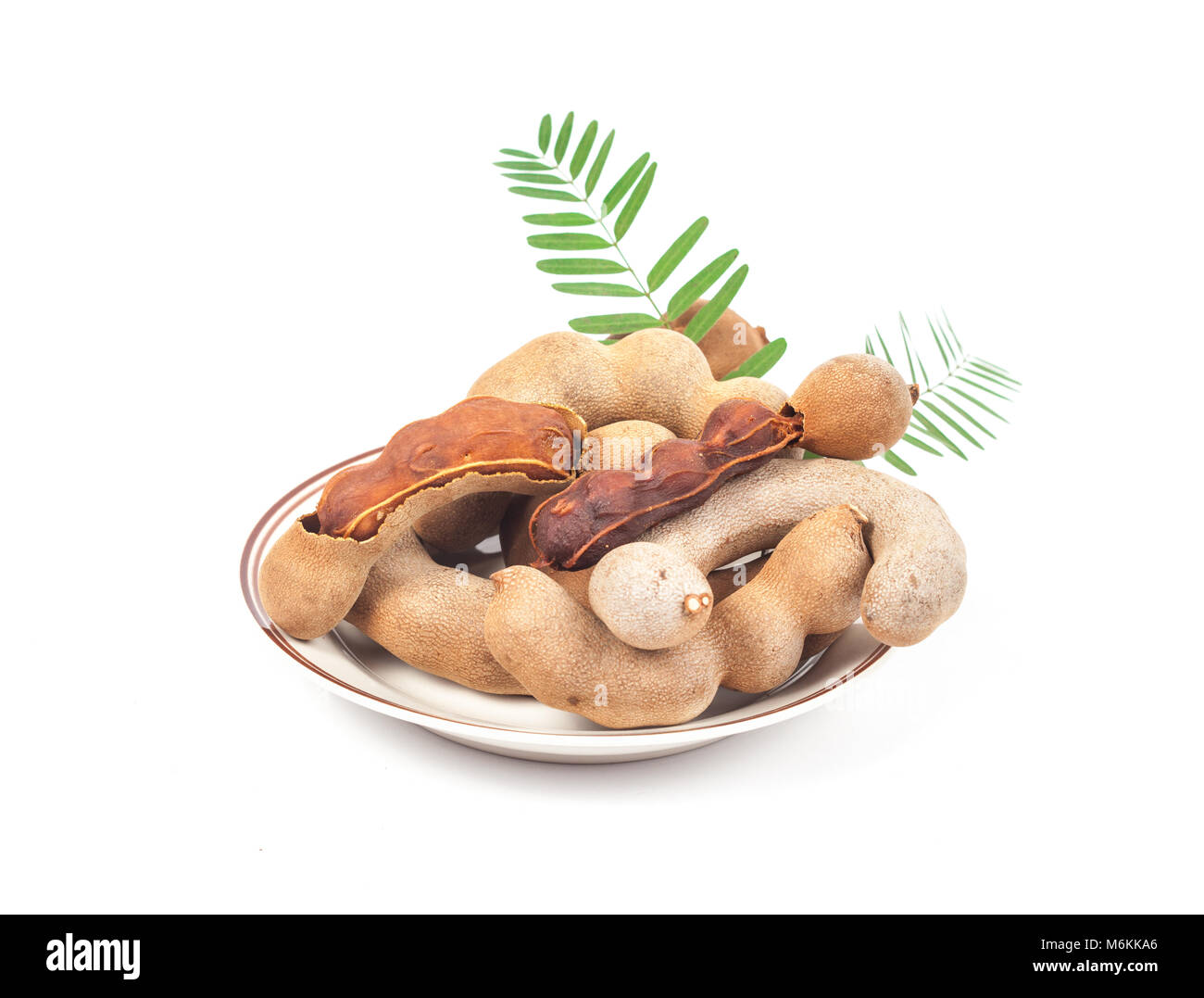 tamarind - Sweet ripe tamarind with isolated on a white background ...