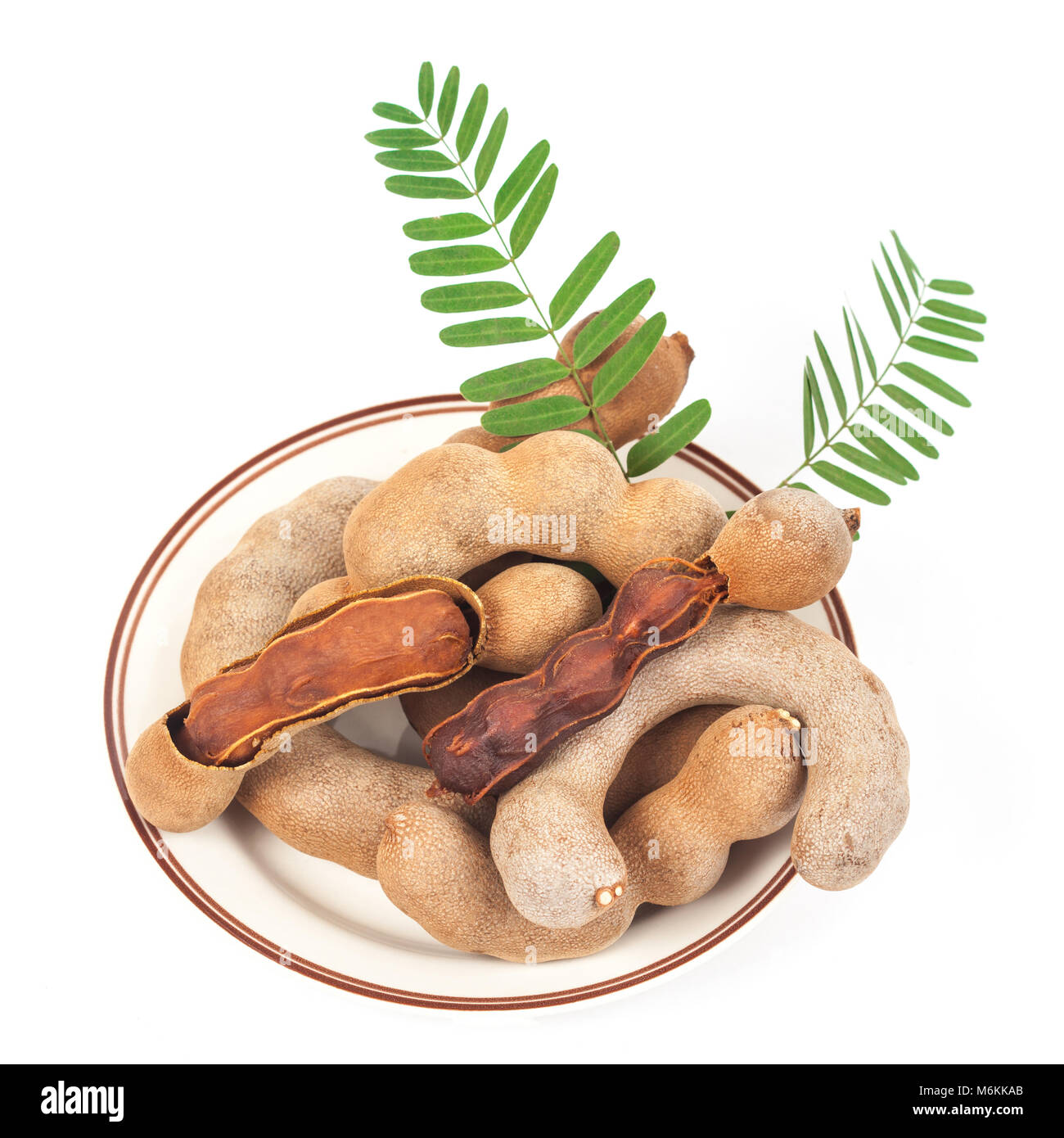 tamarind - Sweet ripe tamarind with isolated on a white background ...