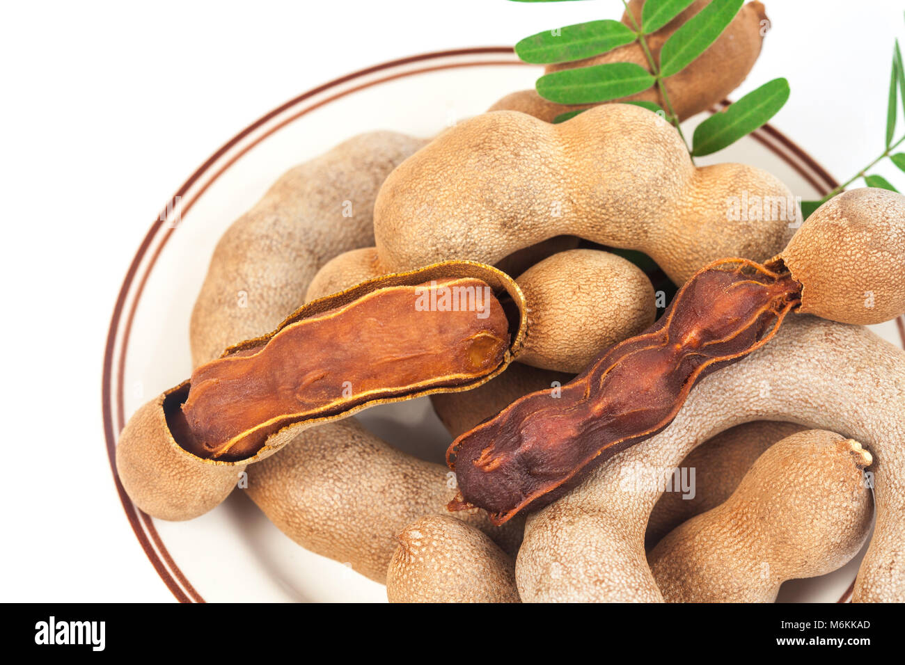 tamarind - Sweet ripe tamarind with isolated on a white background ...