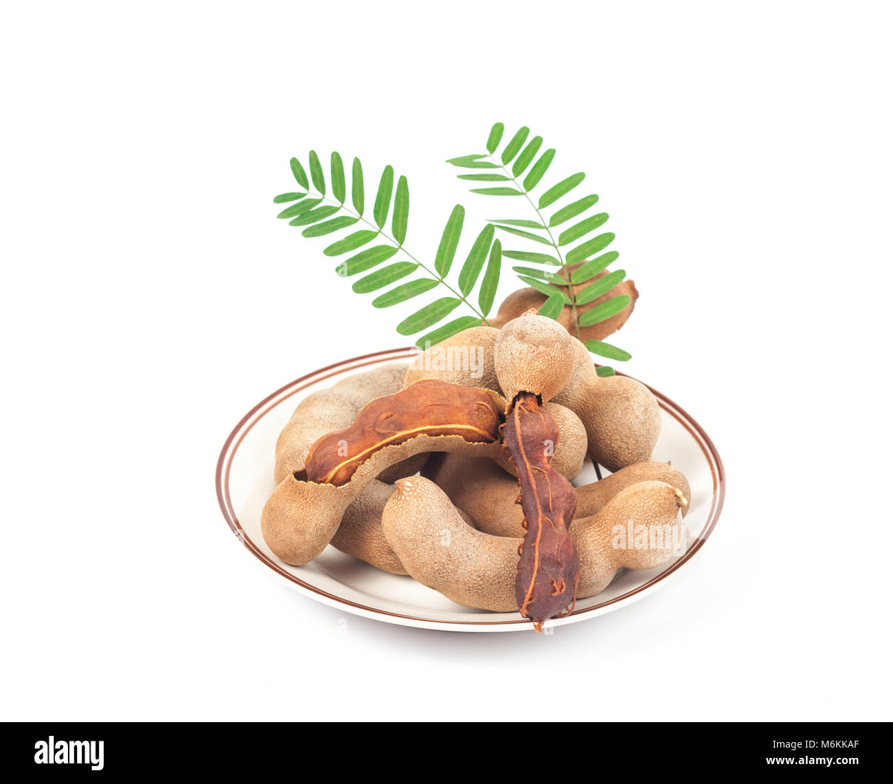 tamarind - Sweet ripe tamarind with isolated on a white background ...