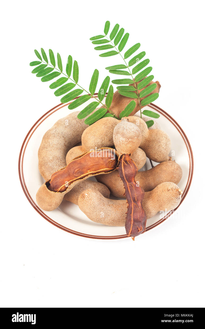 tamarind - Sweet ripe tamarind with isolated on a white background ...