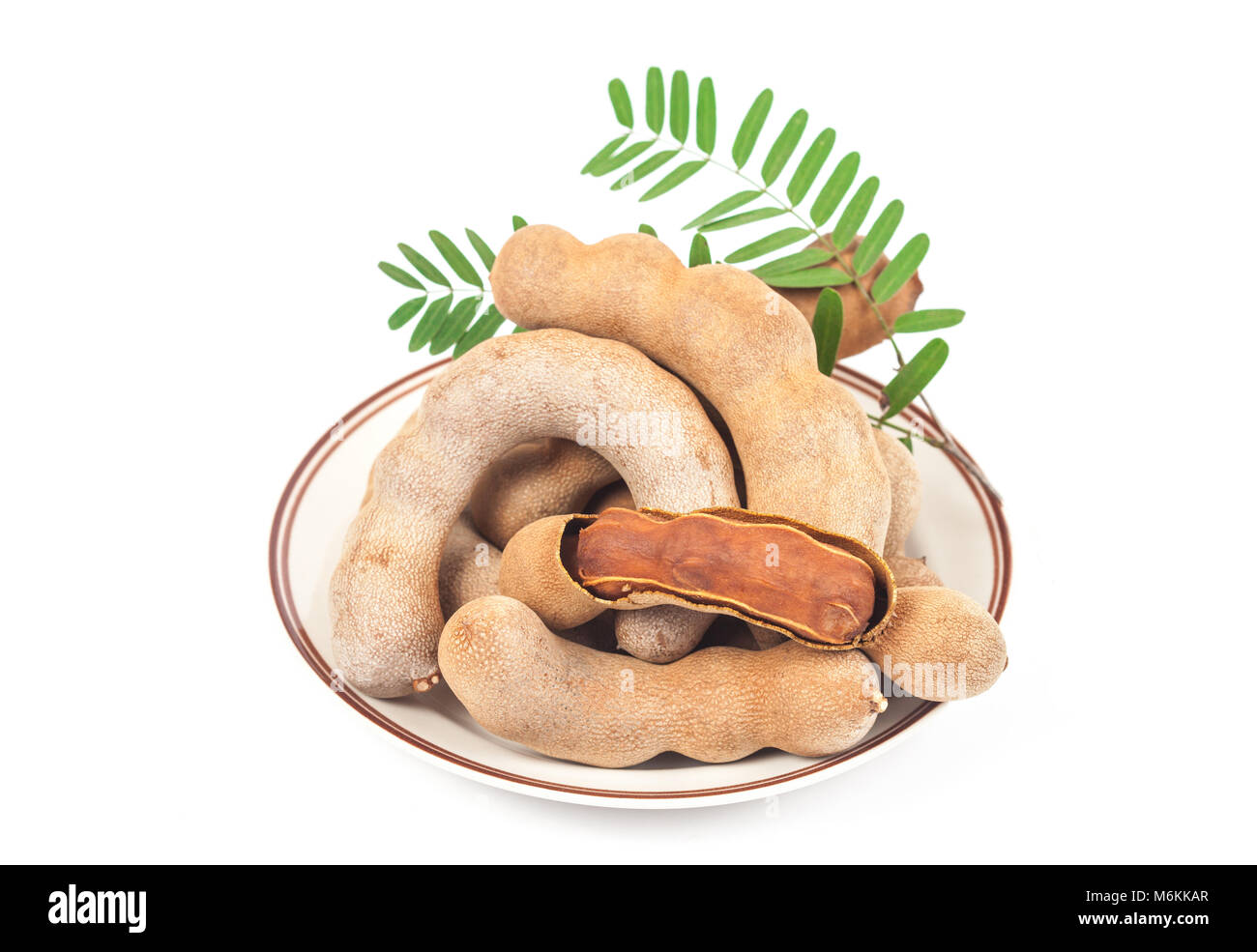 tamarind - Sweet ripe tamarind with isolated on a white background ...