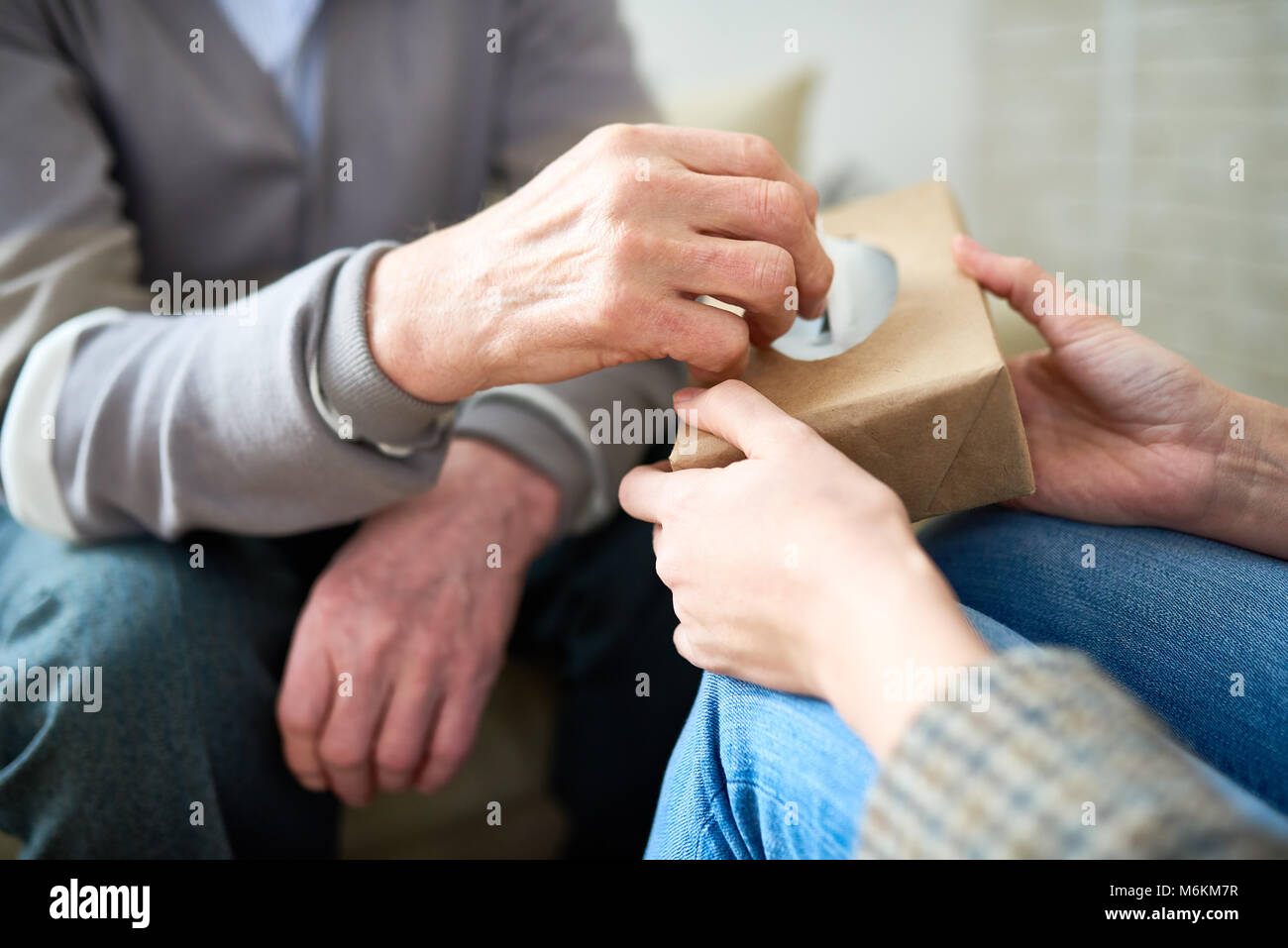 Psychiatrist Offering Tissues to Senior Patient Stock Photo - Alamy
