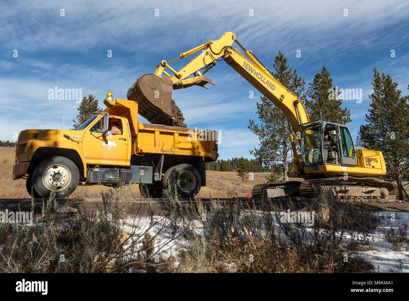 Maintenance crews work to repair a pipeline leak near Canyon Stock ...