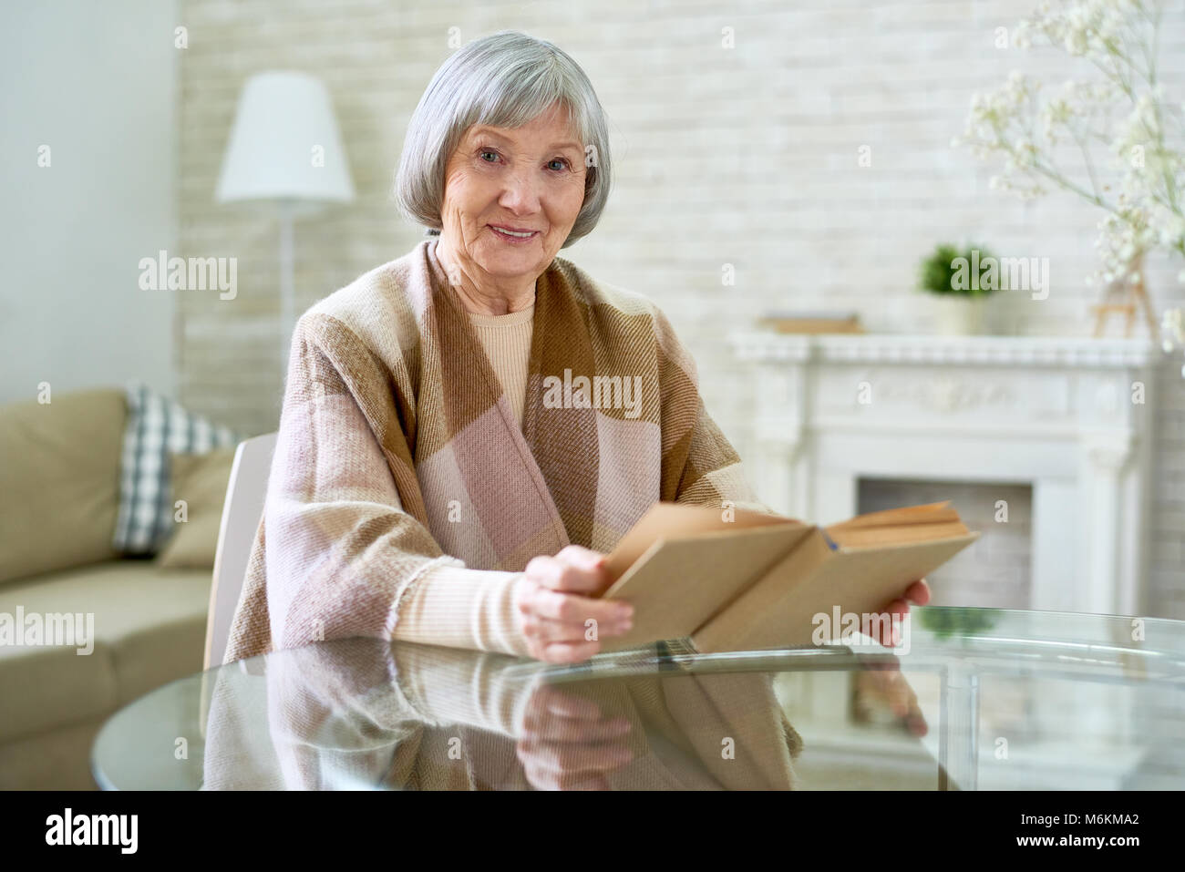 Elegant Senior Lady Reading Book Stock Photo - Alamy