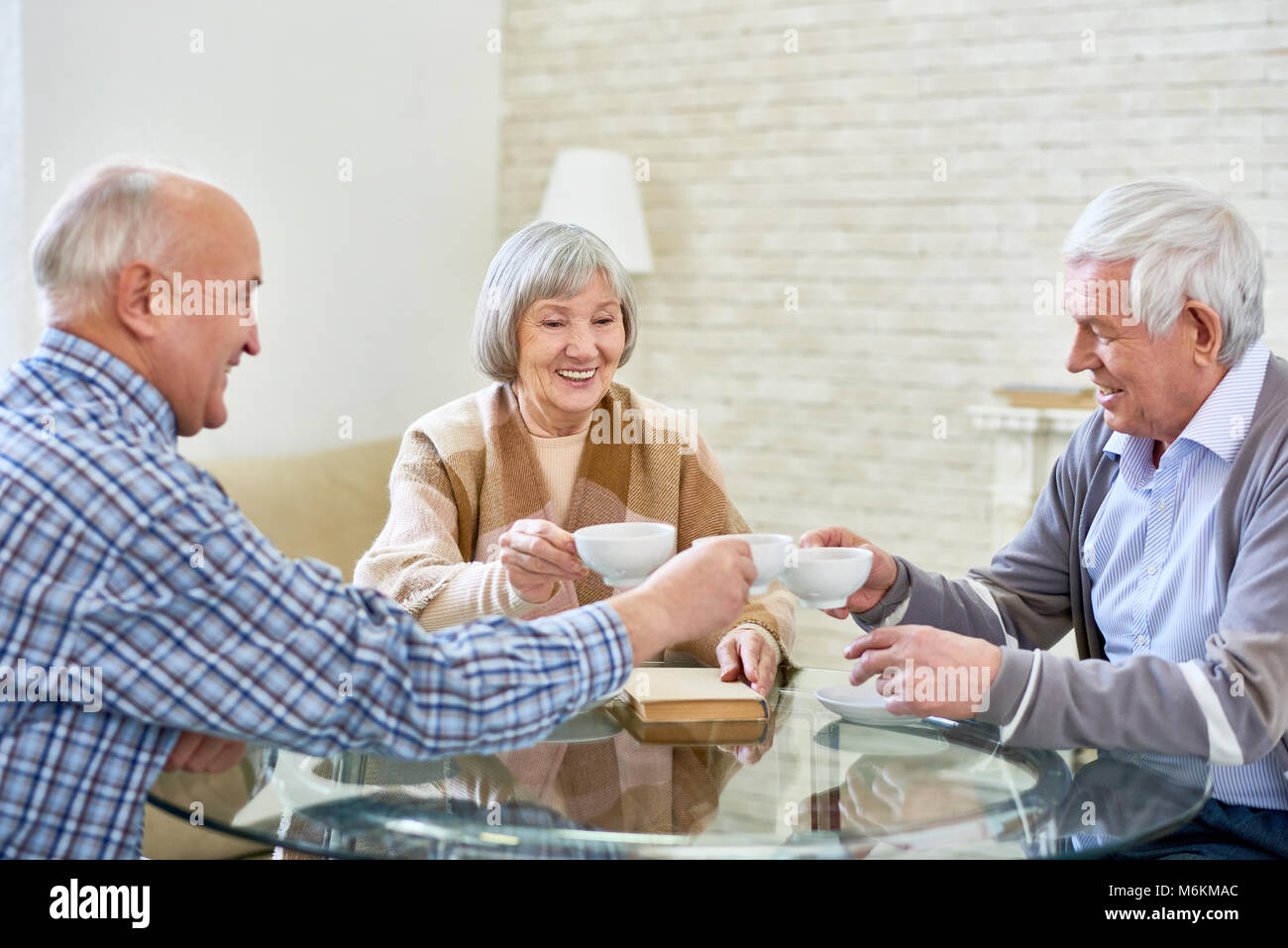 Group of Senior Friends Enjoying Tea Stock Photo - Alamy