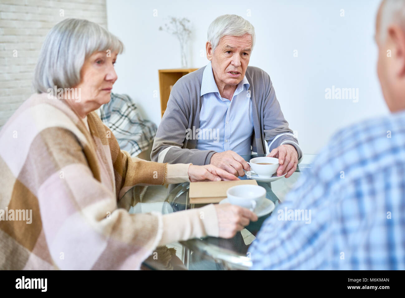Elderly man woman talking house hi-res stock photography and images - Alamy