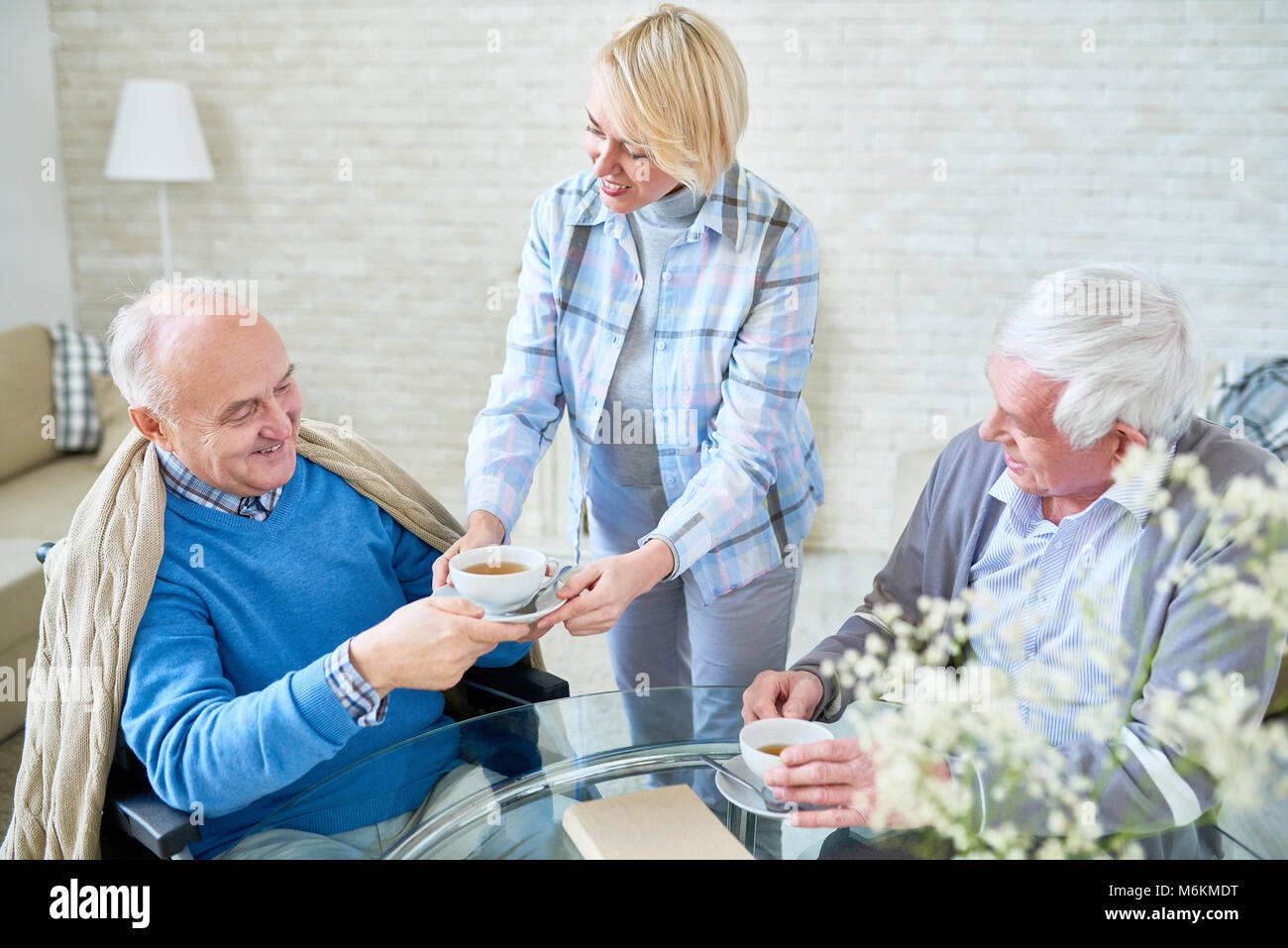 Modern Senior People Enjoying Tea Stock Photo - Alamy