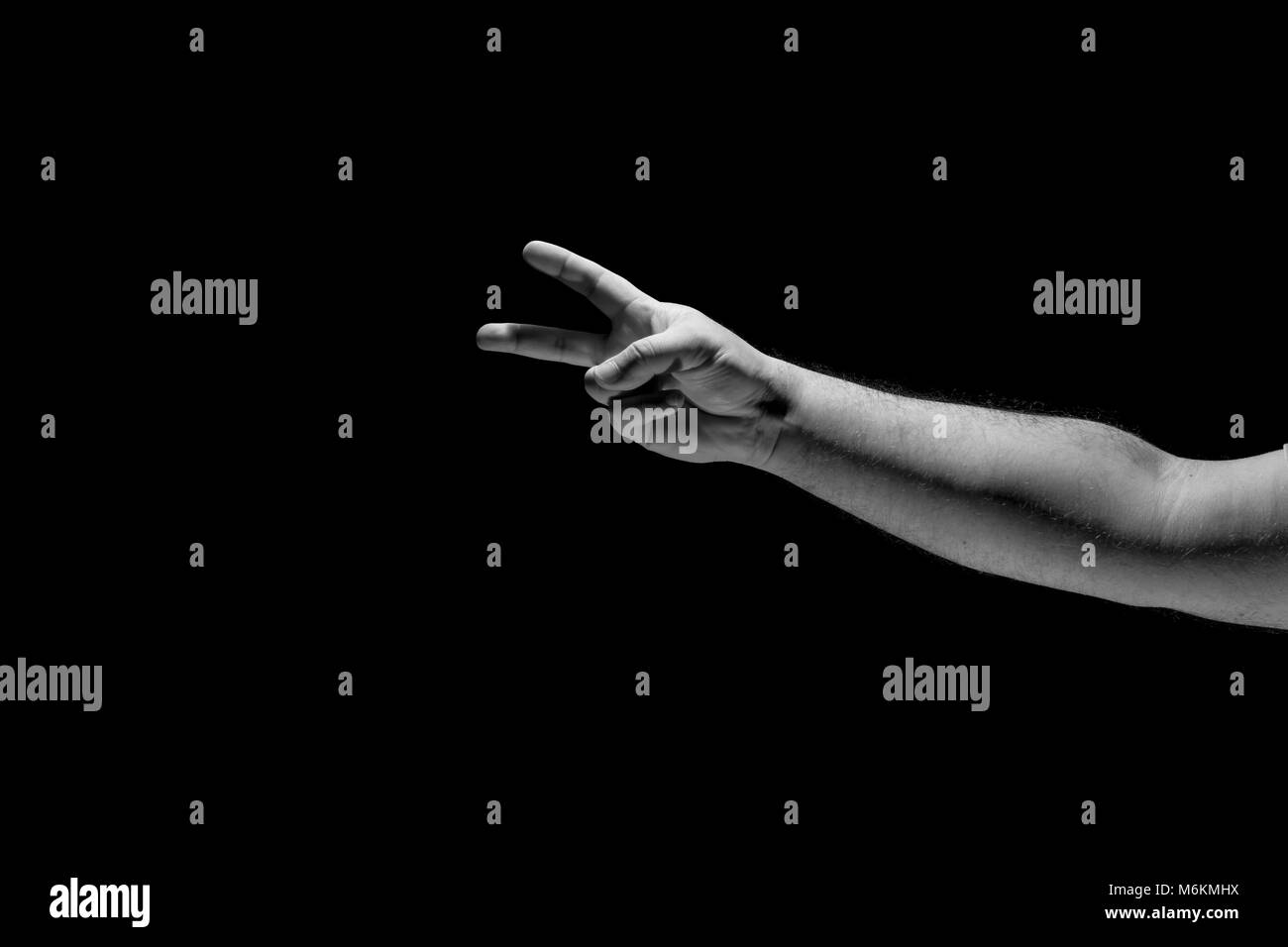 Black man showing silence gesture hi-res stock photography and images ...