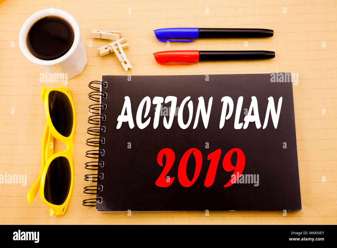 Hand writing text caption showing Action Plan 2019. Business concept ...