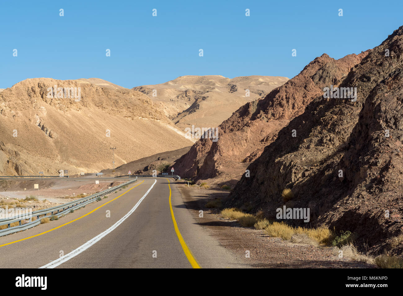 Asphalt road in desert Negev, Israel, road 12, transport infrastructure ...