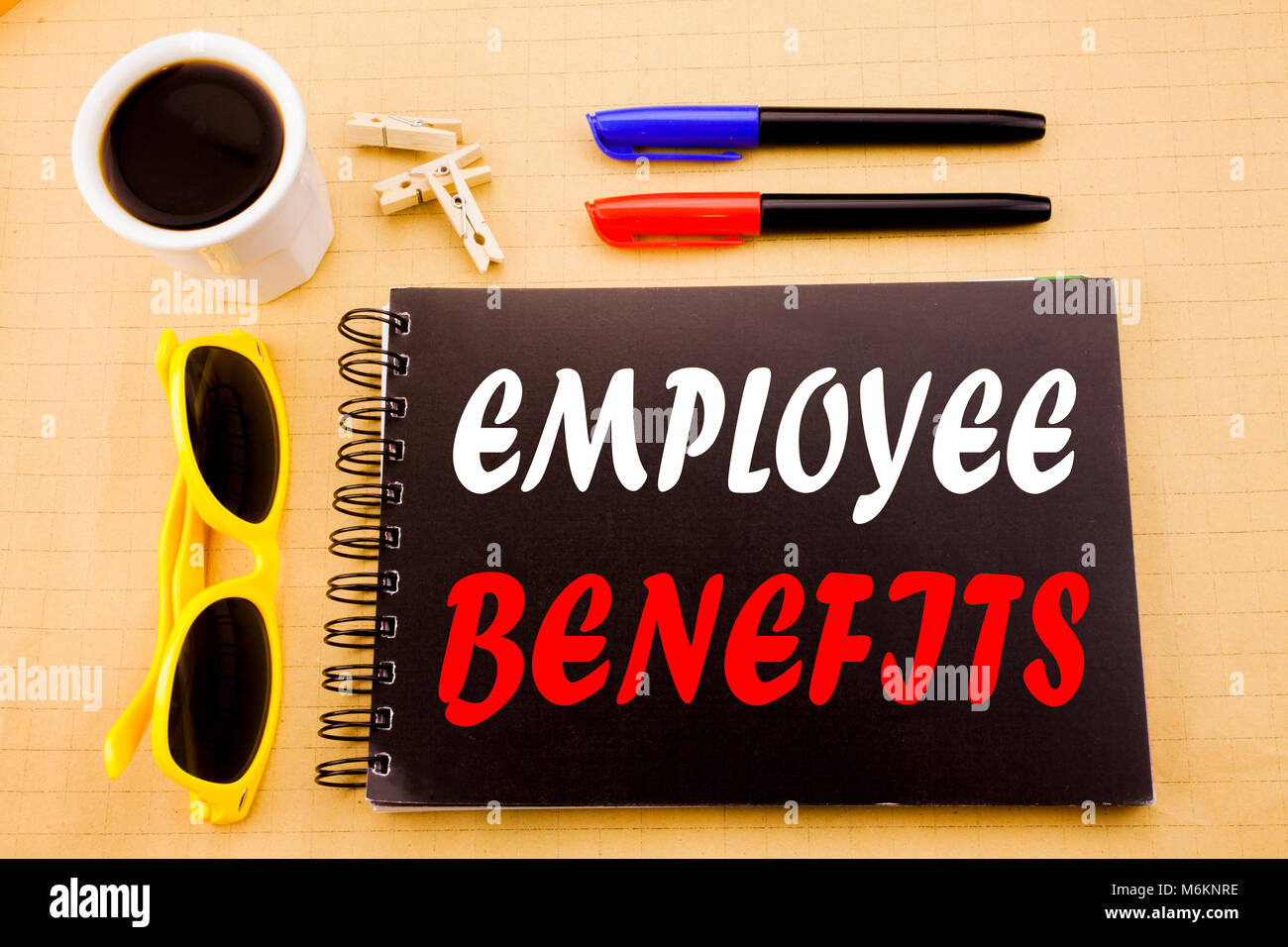 Hand writing text caption showing Employee Benefits. Business concept ...