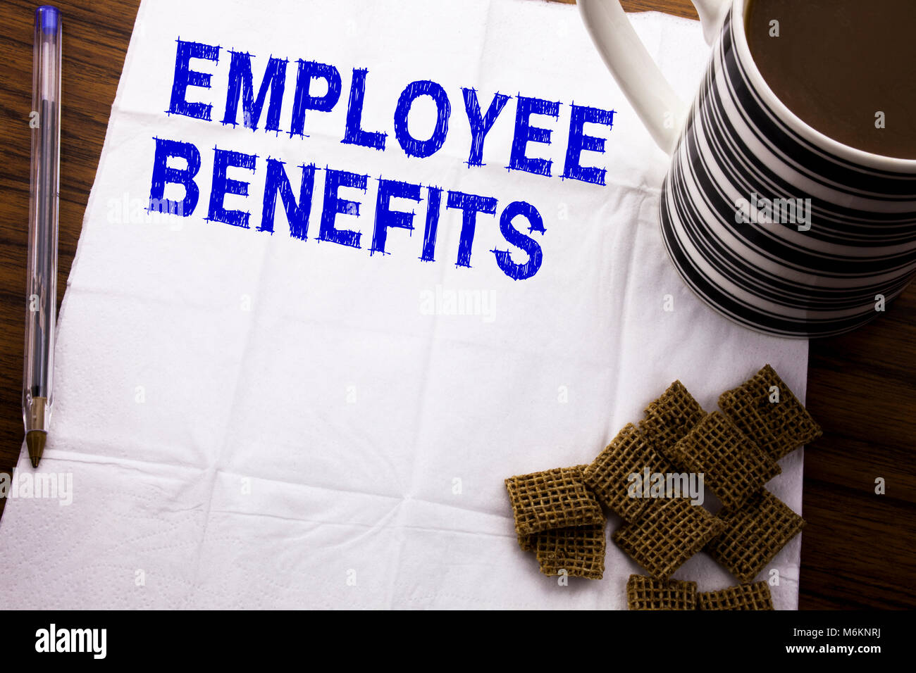 Hand writing text caption showing Employee Benefits. Business concept ...