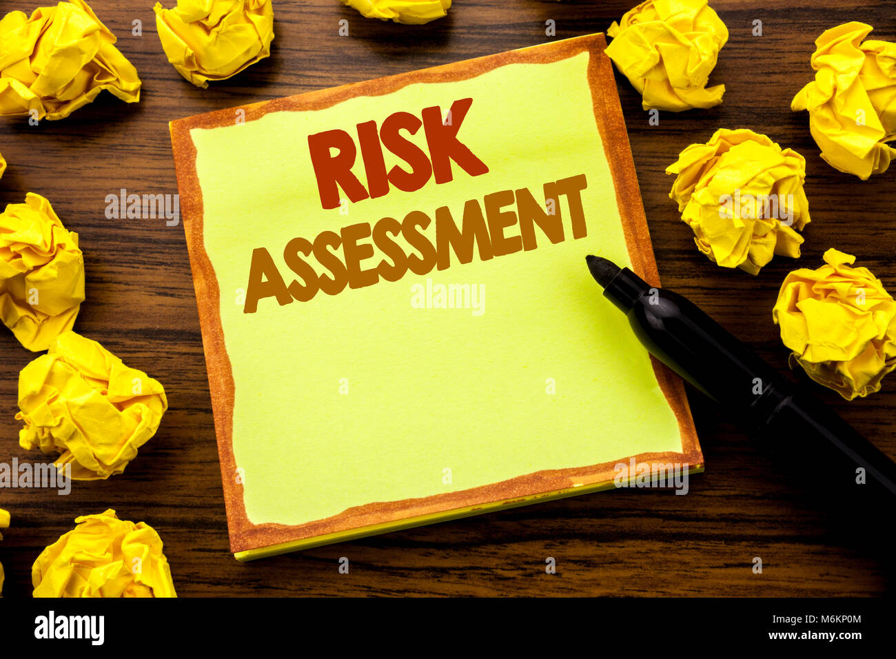 Hand writing text caption showing Risk Assessment. Business concept for ...