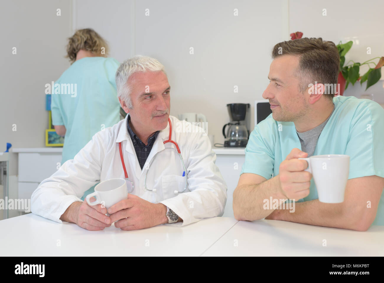 medical doctor team taking coffee break Stock Photo - Alamy