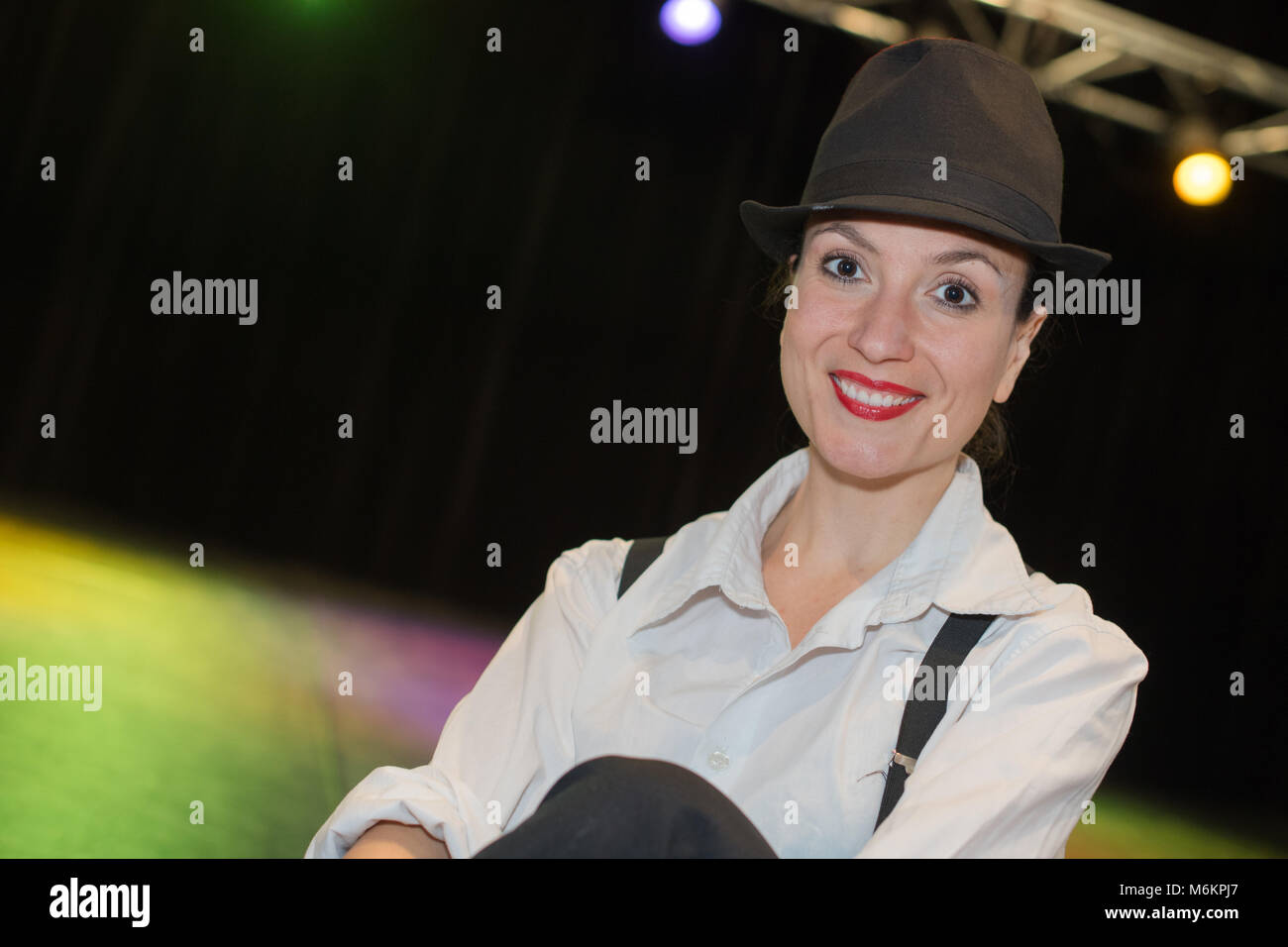 female actress alone on stage Stock Photo - Alamy