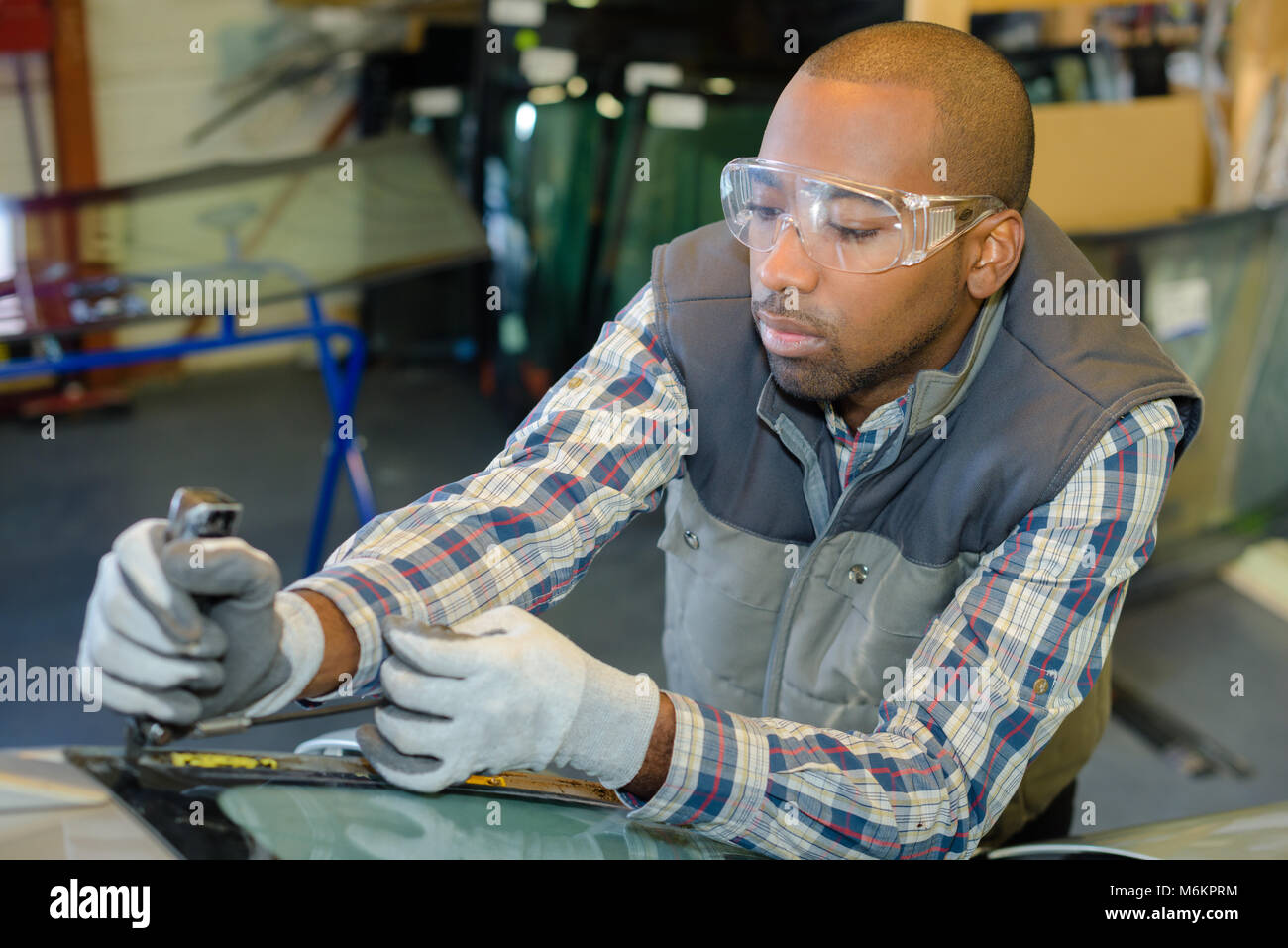 workman using angle grinder Stock Photo - Alamy