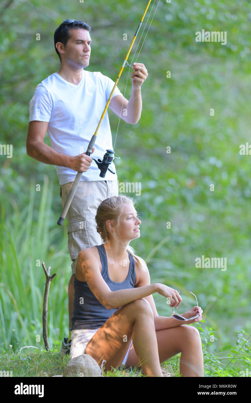 love story couple is fishing Stock Photo - Alamy