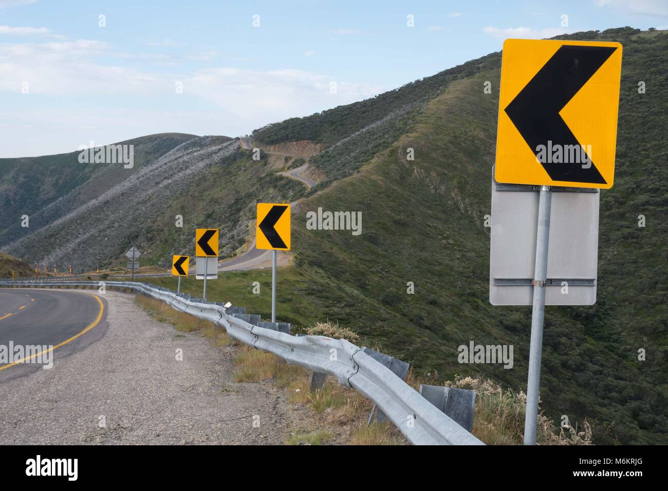 Winding road signs hi-res stock photography and images - Alamy