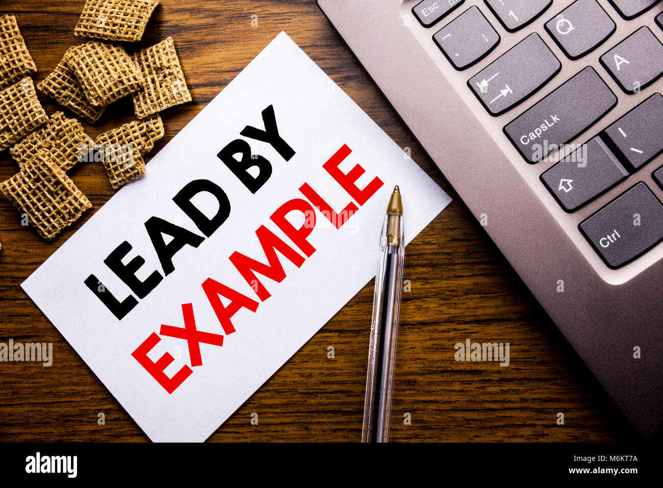 Handwriting Announcement text showing Lead By Example. Business concept ...