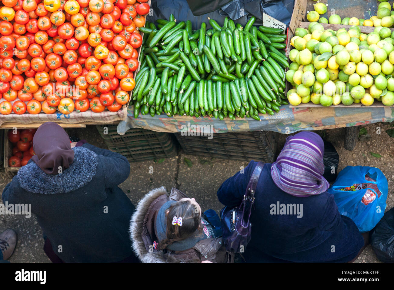 Ramallah, Palestine, January 12, 2011: A man selling fresh fruits and ...
