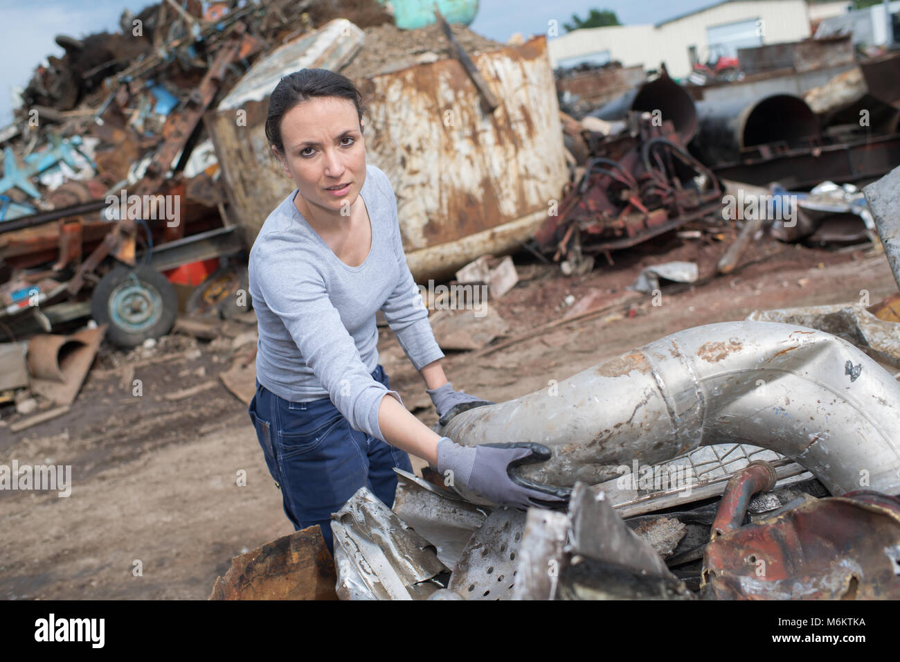 Worker collecting scrap metal hi-res stock photography and images - Alamy