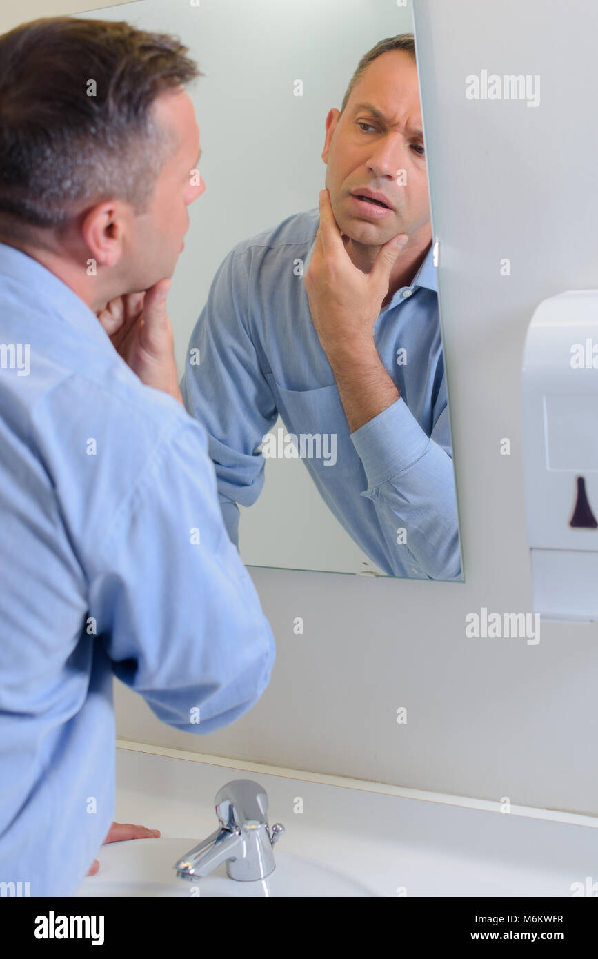 Inspecting face hi-res stock photography and images - Alamy