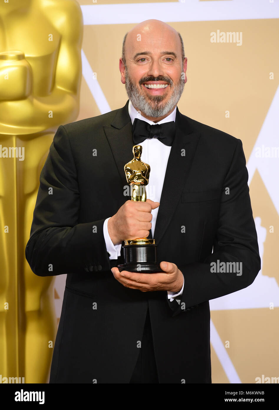Mark Bridges with his oscar for Best Costume Design in Phantom Thread ...