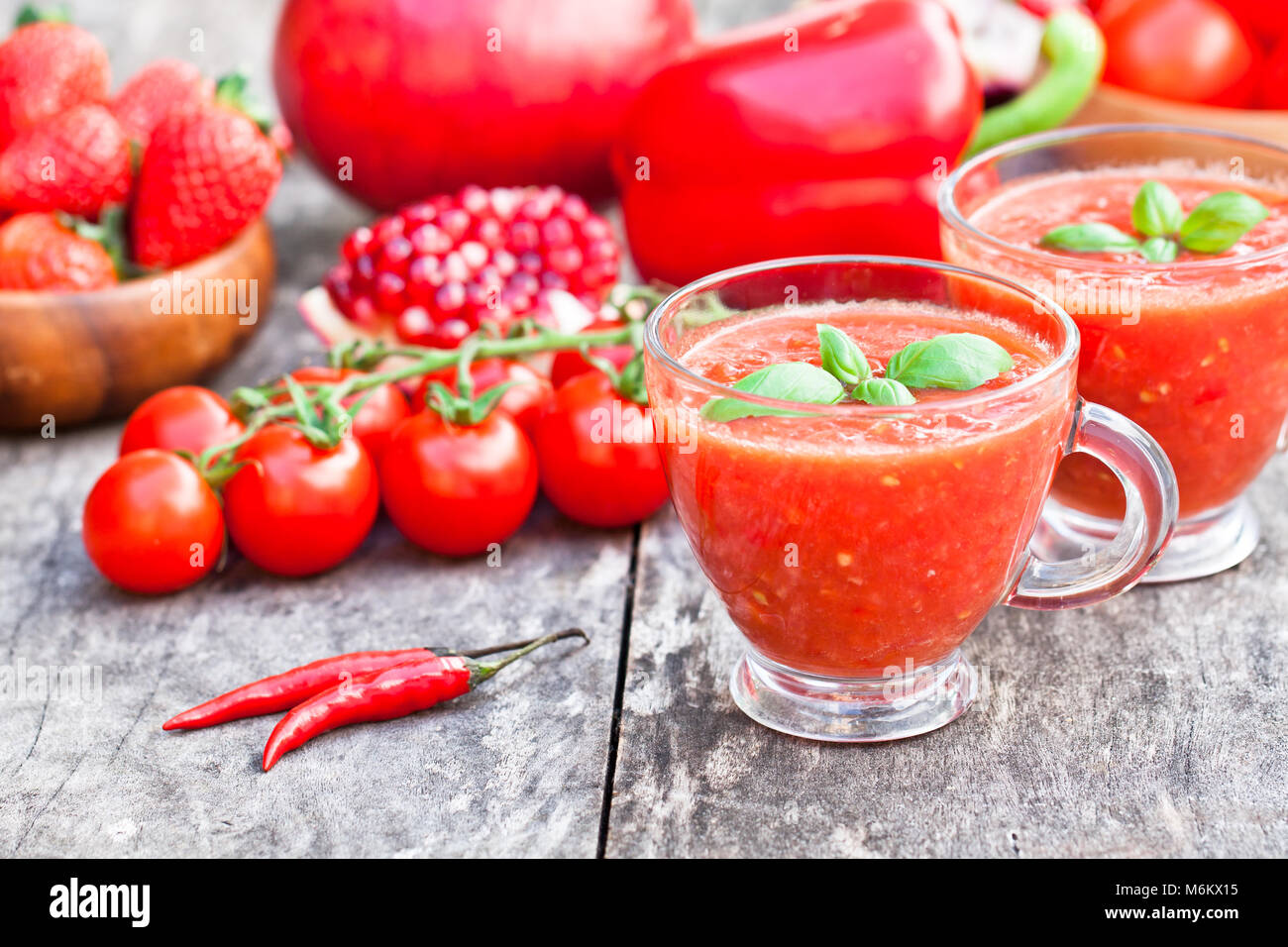 red healthy vitamin cocktail in the glass cup Stock Photo - Alamy