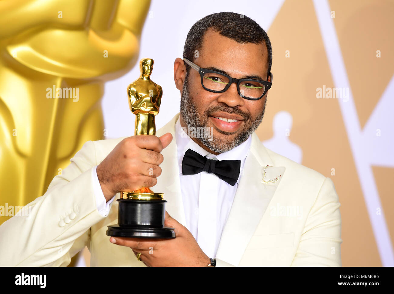 Jordan Peele with his Best Original Screenplay Oscar for Get Out in the ...