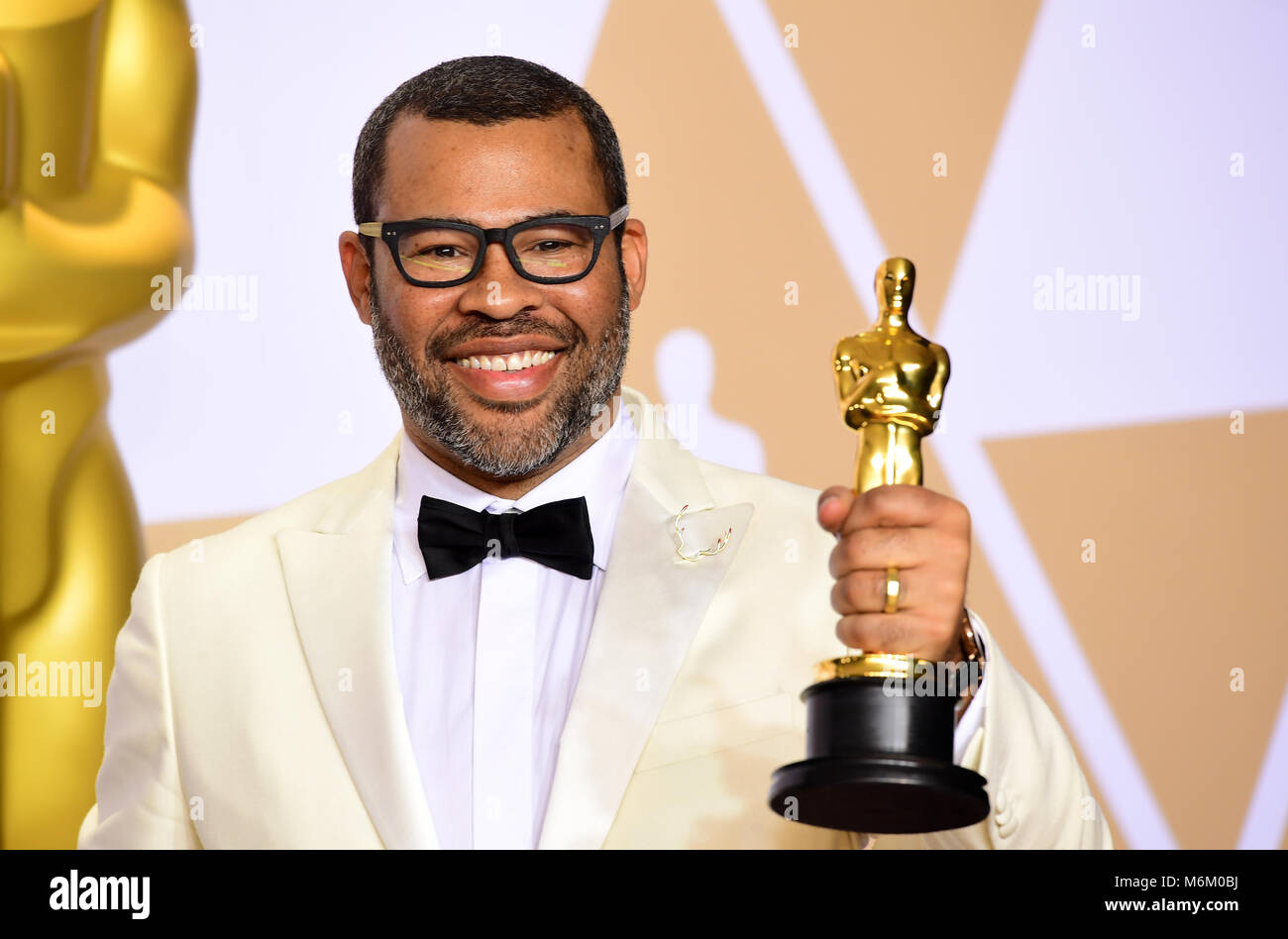 Jordan Peele with his Best Original Screenplay Oscar for Get Out in the ...