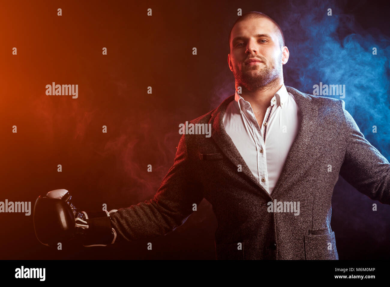 Young intelligent man businessman in white shirt, gray suit, black and ...